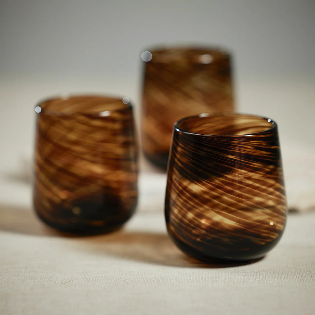 Stemless Tortoise Spiral Glass – Amber & Black | Swirled Artisan ...